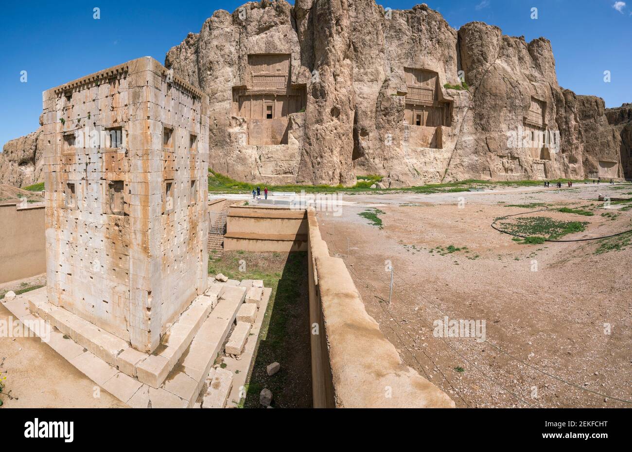 Sandstone rock with carved tombs of persian kings in Necropolis, Iran ...