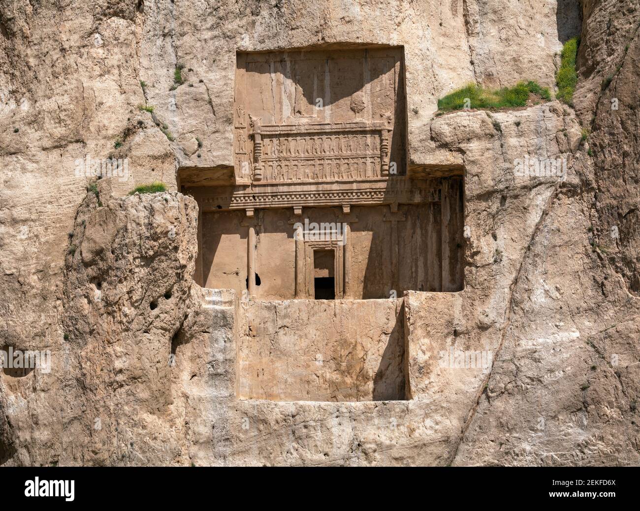 Sandstone rock with carved tombs of persian kings in Necropolis, Iran ...