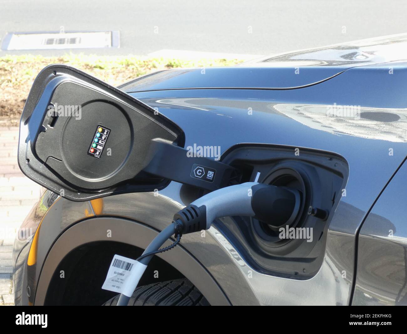 Cologne, Germany. 21st Feb, 2021. An electric car charging at an ...
