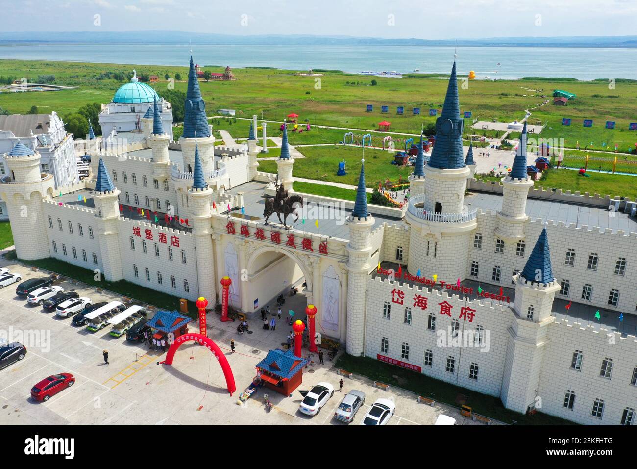 Aerial view of a European style castle by Lake Dai in Ulanqab city ...