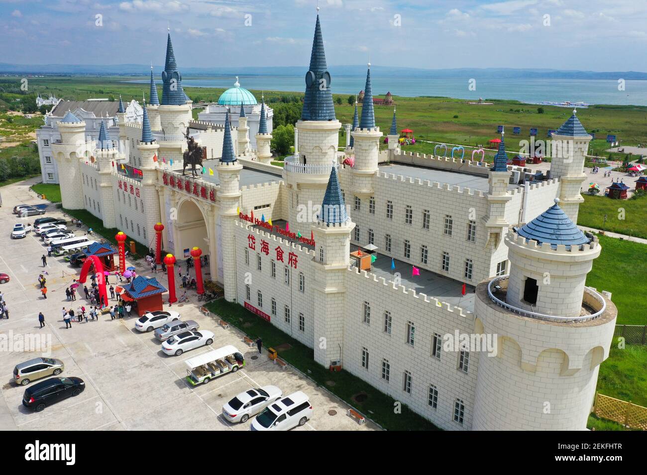 Aerial view of a European style castle by Lake Dai in Ulanqab city ...