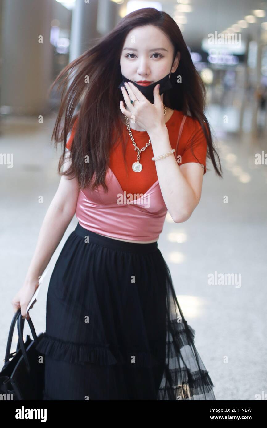 Chinese actress and producer Alina Zhang arrives at a Beijing airport ...