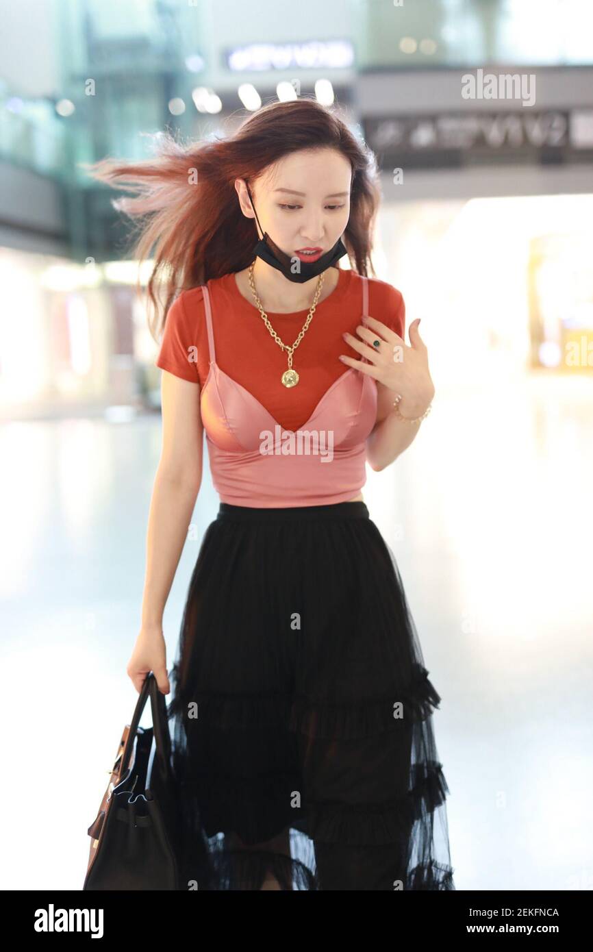 Chinese Actress And Producer Alina Zhang Arrives At A Beijing Airport