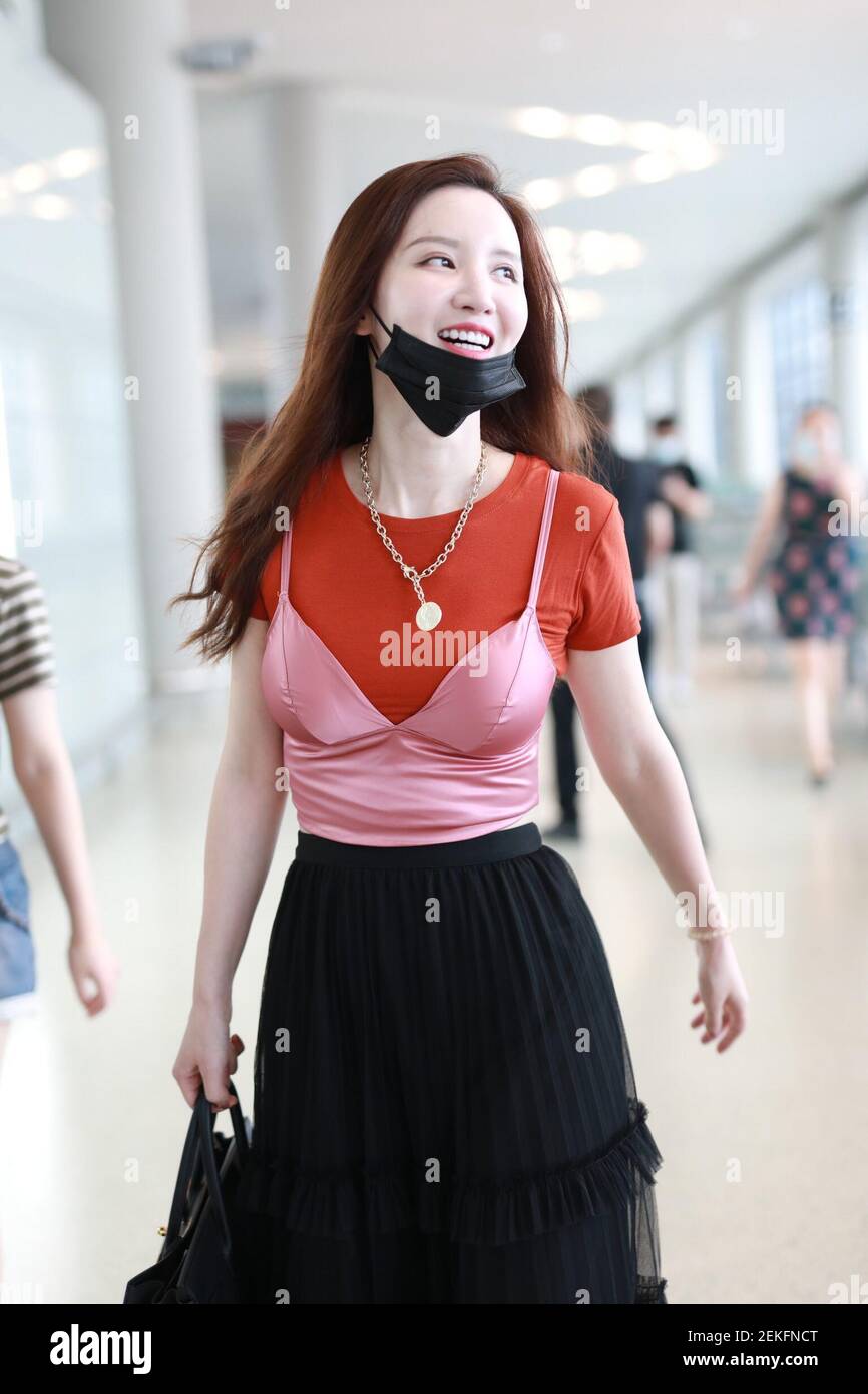 Chinese actress and producer Alina Zhang arrives at a Beijing airport ...