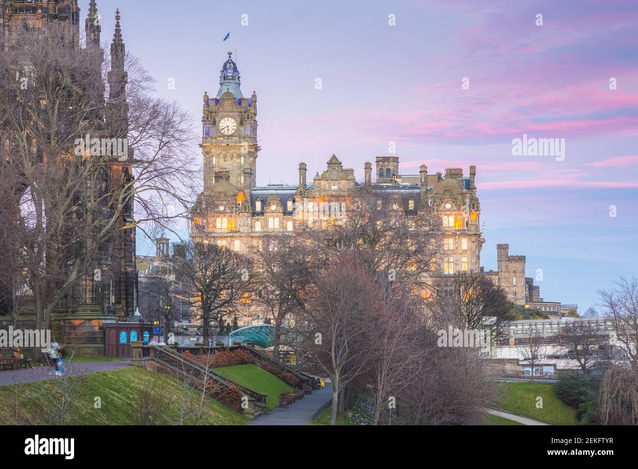 Night cityscape in Edinburgh, Scotland with colourful sunset or sunrise ...