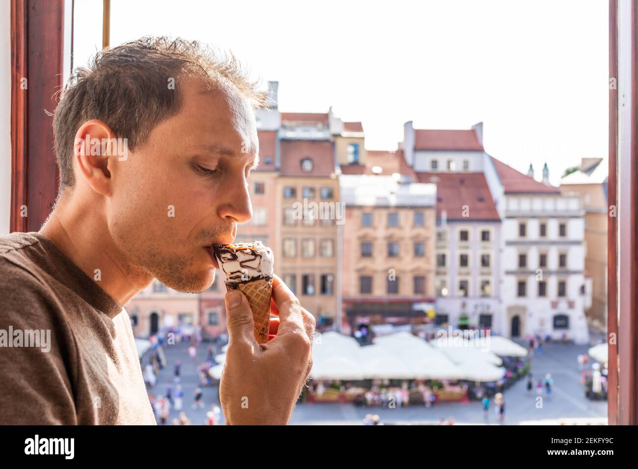 Man eating ice cream cone hi-res stock photography and images - Alamy