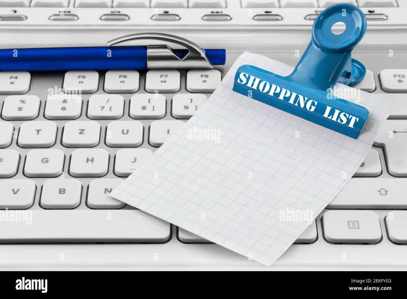 Shopping list background and PC keyboard Stock Photo - Alamy