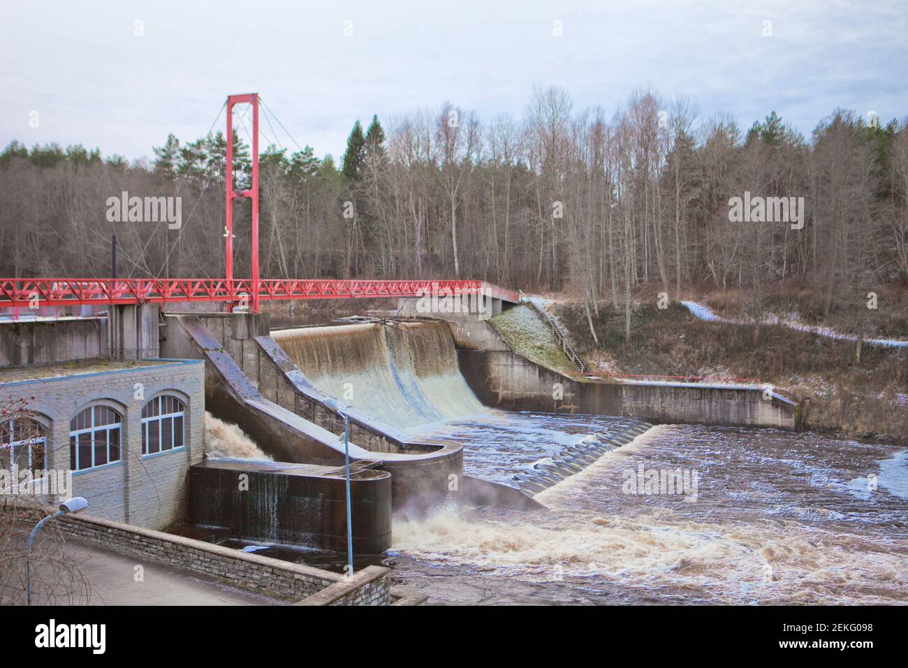 Hydroelectric power station water level at the early winter. Green ...