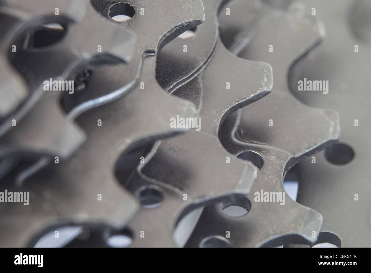 Black teeth of a bicycle cassette in a macro photo. Selective focus ...
