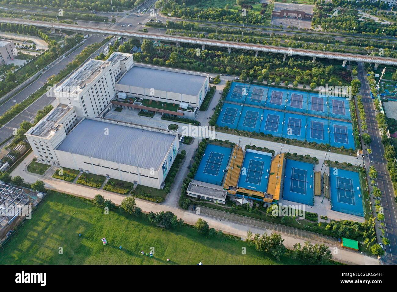 An aerial view of the Zhongyuan Tennis Training Base Management Center ...