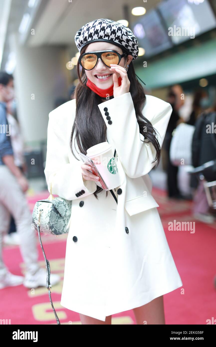 Chinese singer and actress Flora Dai Yanni arrives at a Beijing airport ...