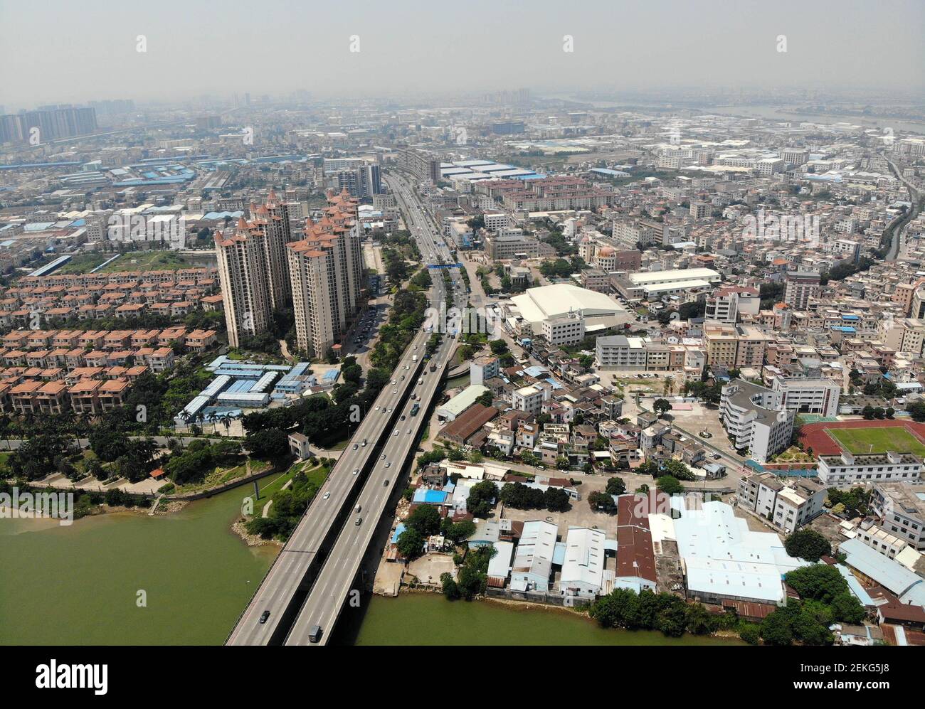 An aerial view of various factories located at a local industrial zone ...