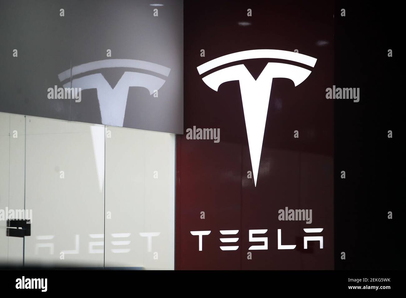 The logo of Tesla, an American electric vehicle and clean energy ...