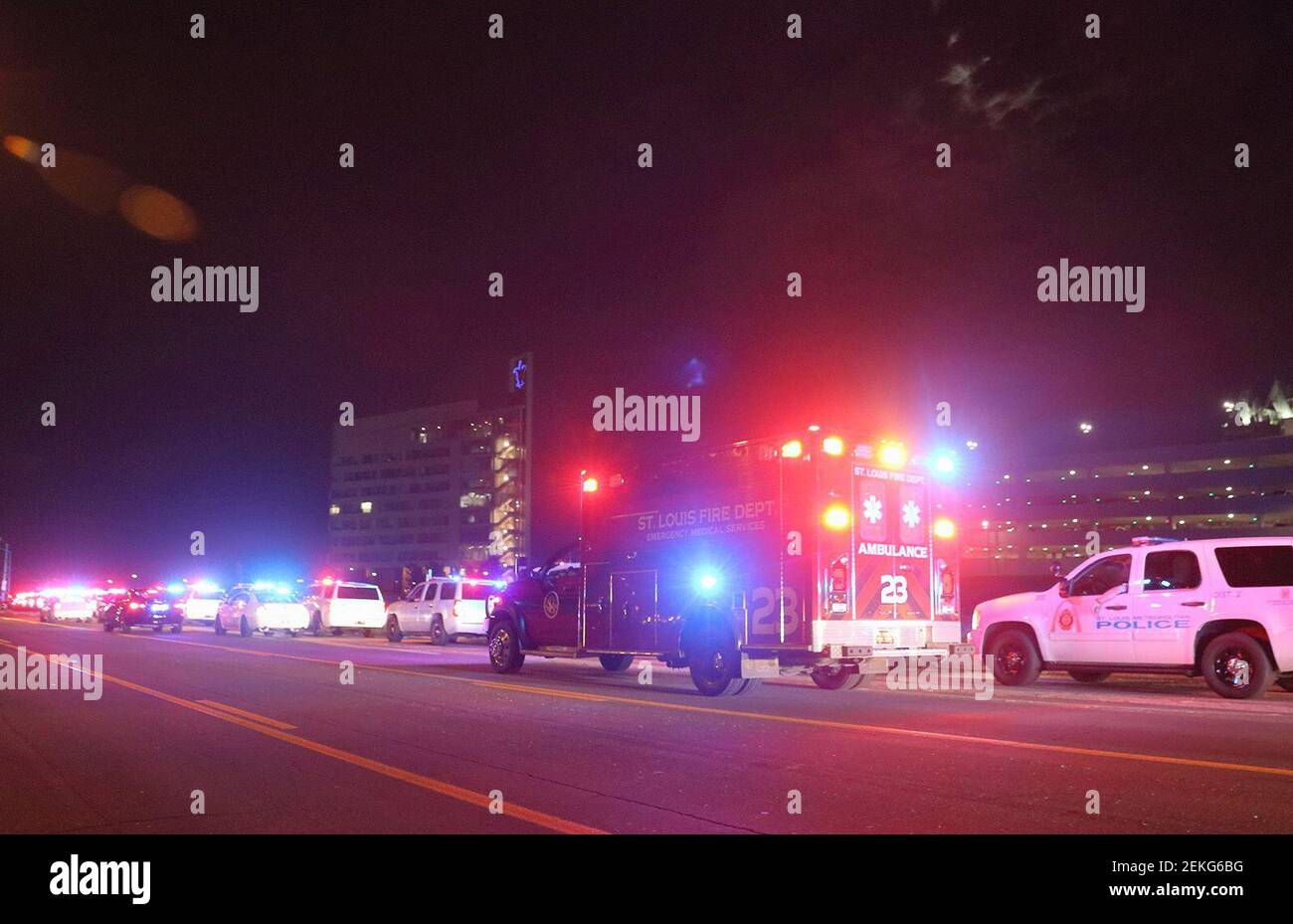 An Ambulance Carries The Body Of St Louis Police Officer Tamarris L