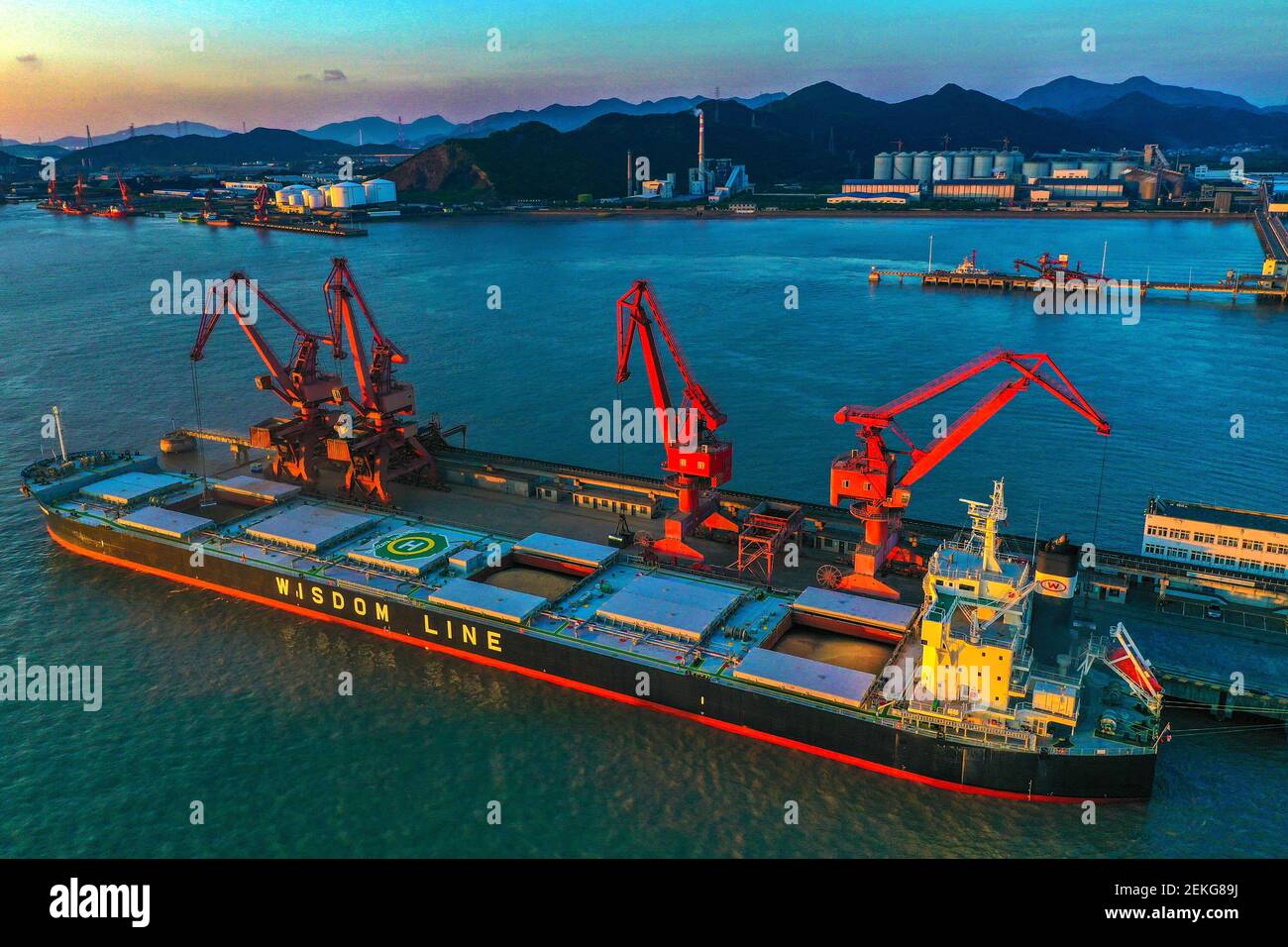 Aerial view of ships uploading and unloading containers at Zhoushan ...