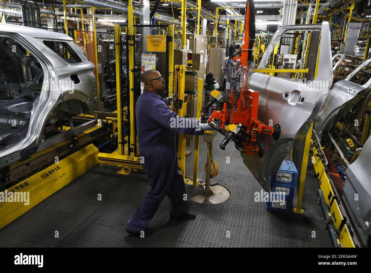 In this file photo, workers on the assembly line at the Ford Chicago ...
