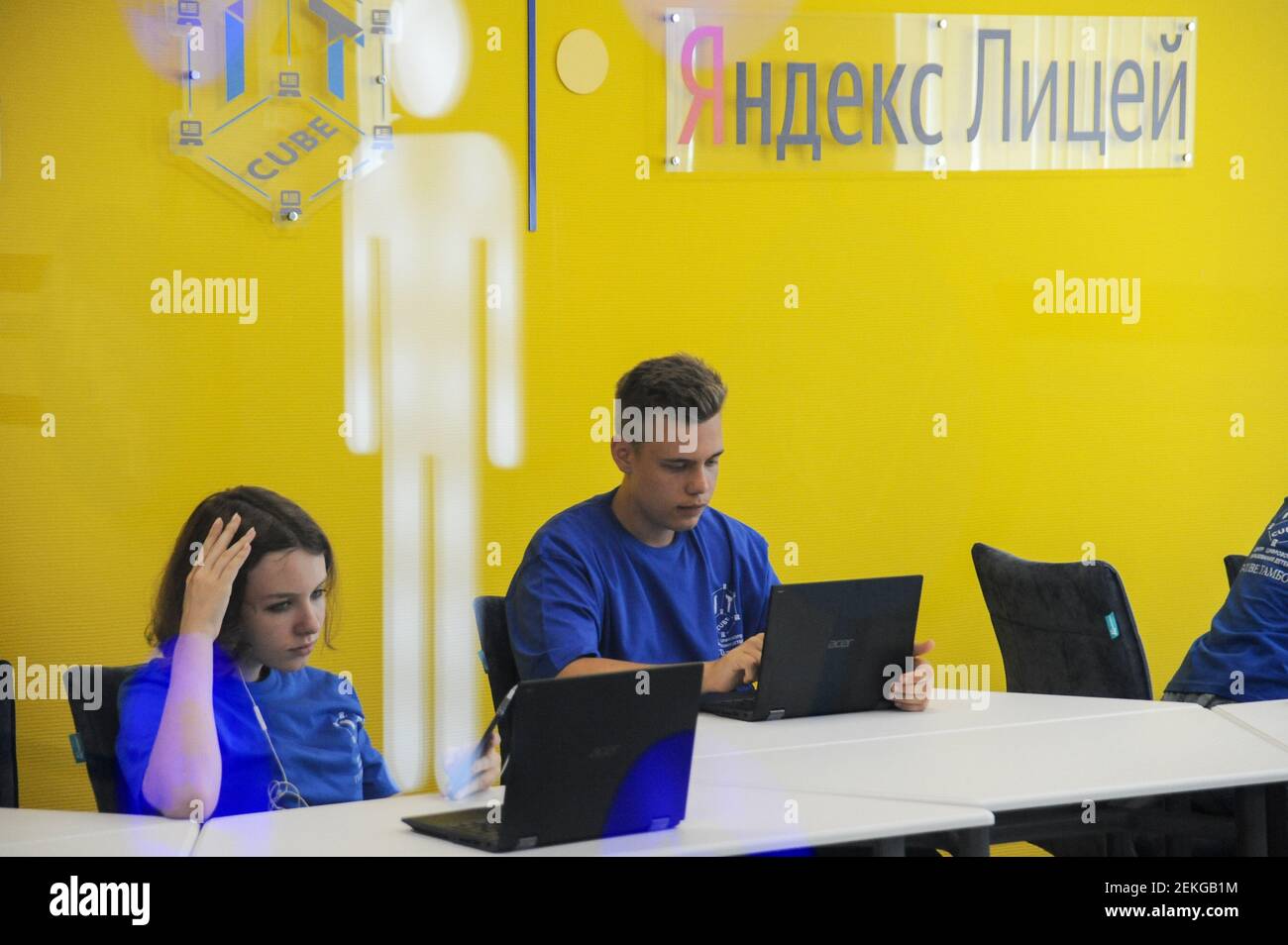 Students without medical masks in the classroom at Yandex Lyceum during the celebration. A ...
