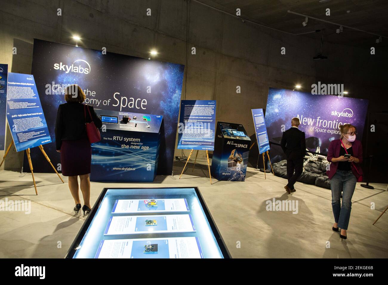 Visitors explore the Moon rock exhibition at the Herman Potocnik ...