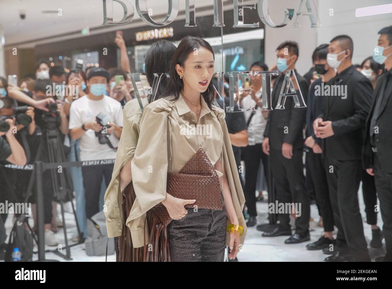 Chinese actress Tong Yao attends the opening ceremony of a new shop of ...