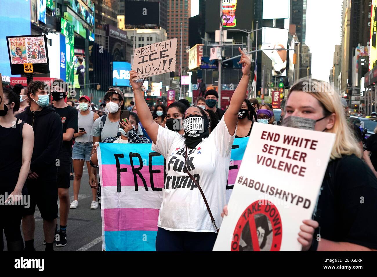 Demonstrators march from Columbus Circle through Times Square in ...