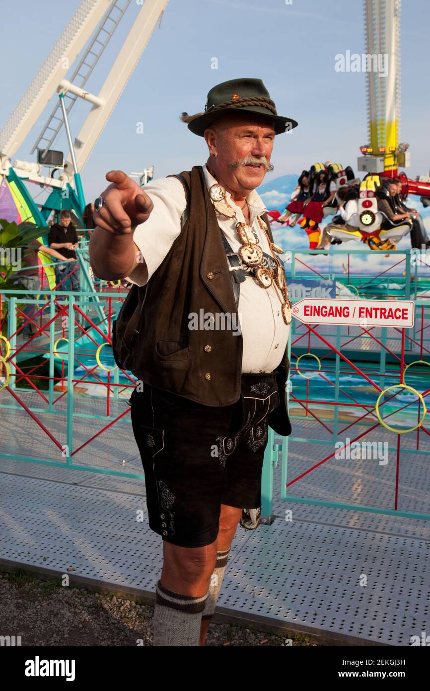 Portrait of Oktoberfest senior man in hat, wearing the traditional ...