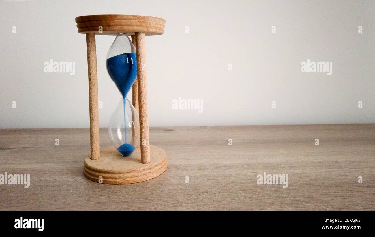 Hourglass or Sandglass. Catch the moment. Sands falling through hour ...