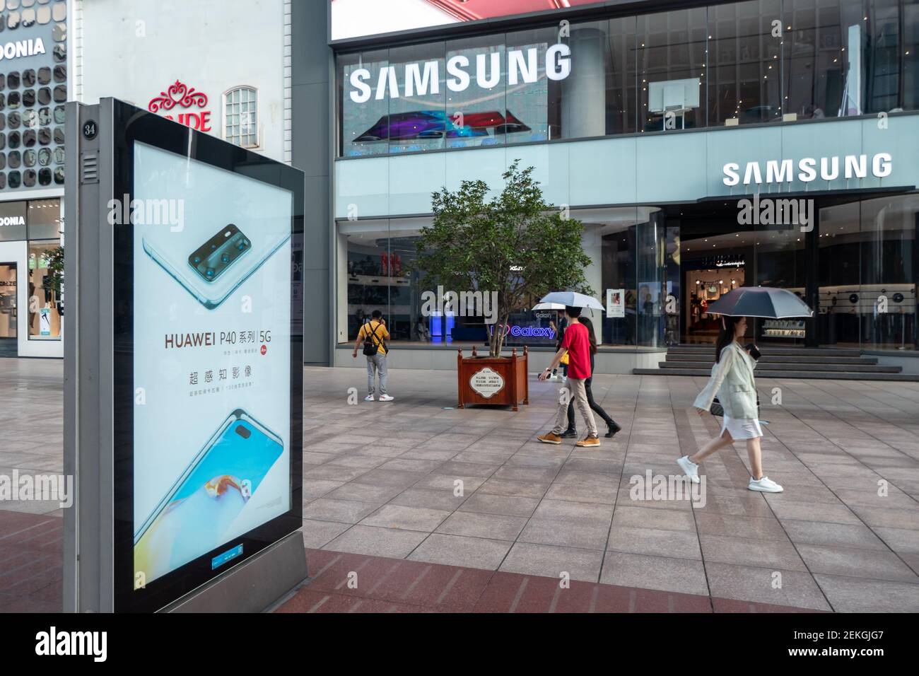 SHANGHAI, CHINA - AUGUST 31, 2020 - Huawei posters and Samsung flagship ...