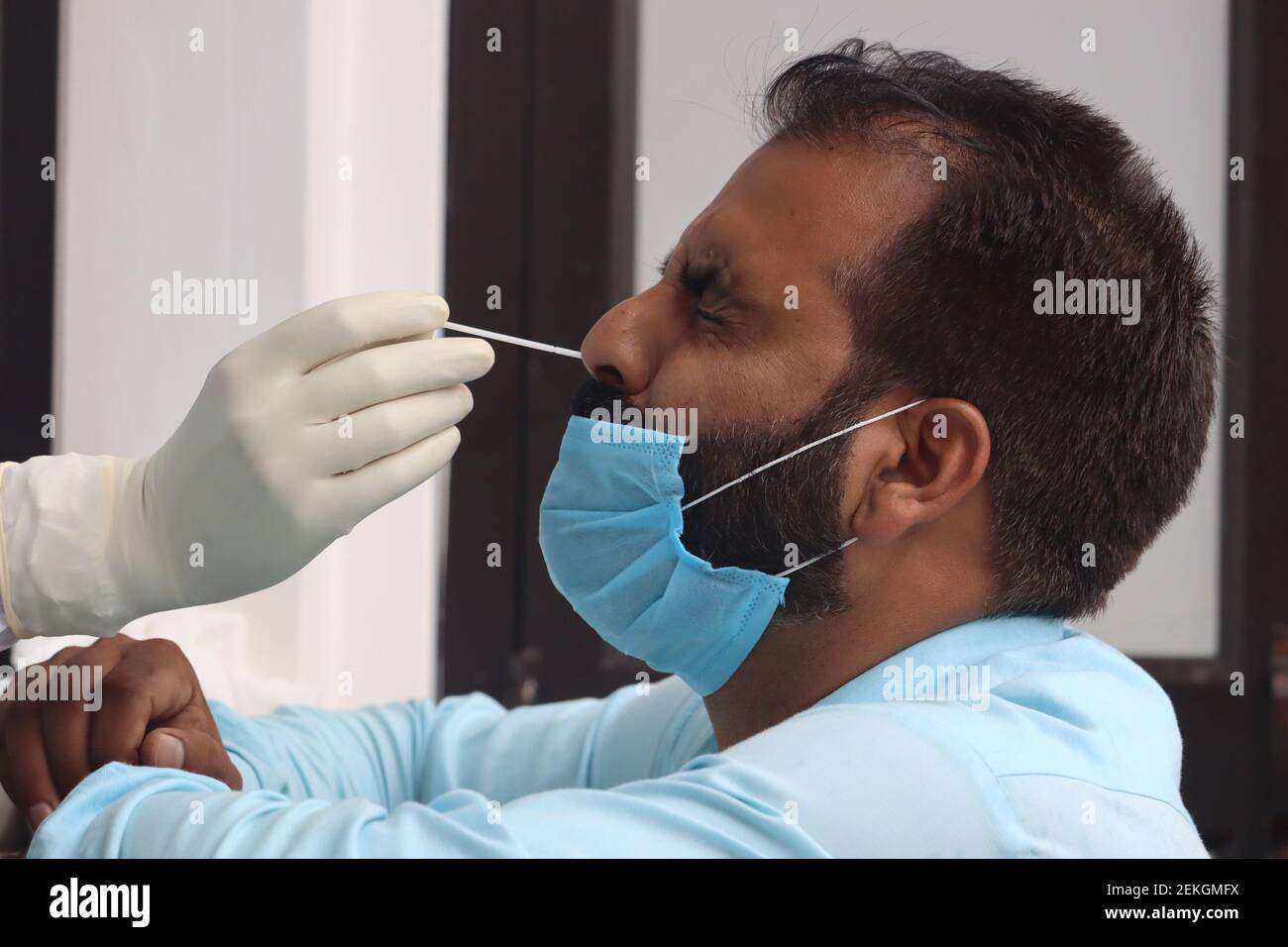 A Healthcare workers wearing PPE during for COVID-19 screening and ...