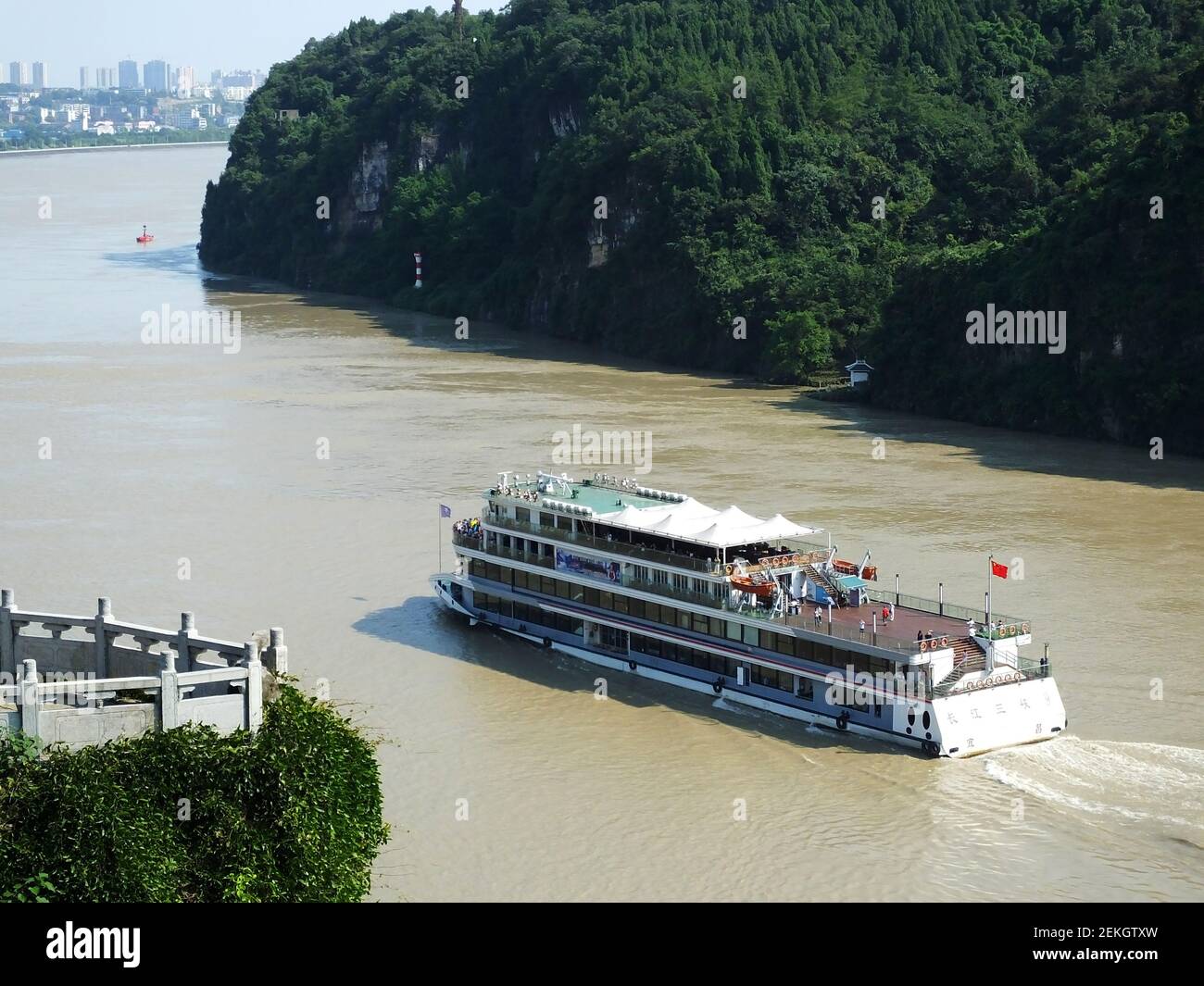 An aerial view of a ship cruising through Xiling Gorge, the largest and ...
