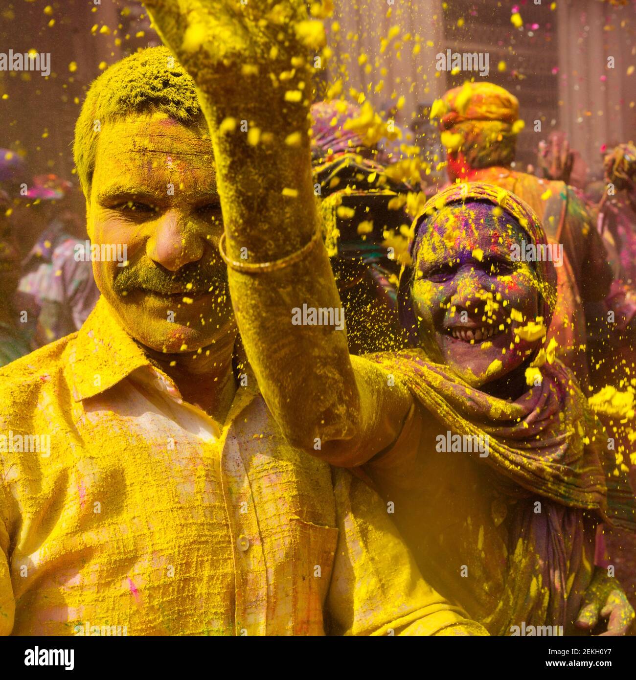 India Vrindavan Senior woman throwing colored powder at the widow's ...