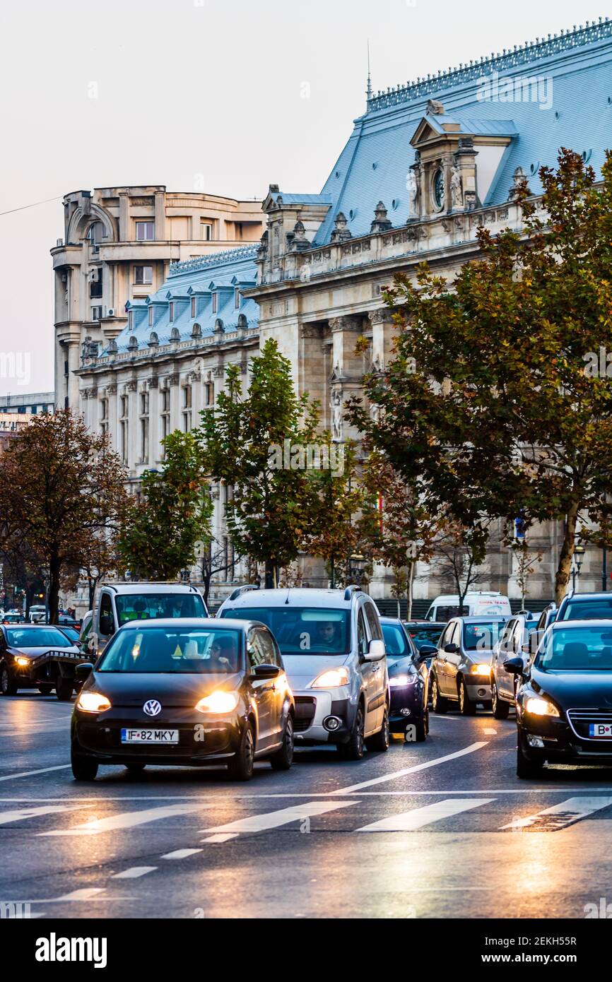 Car traffic at rush hour in downtown area of the city. Car pollution ...
