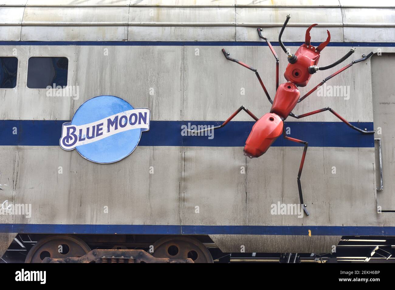 A giant Ant sculpture crawls over a train carriage at Vinegar Yard ...