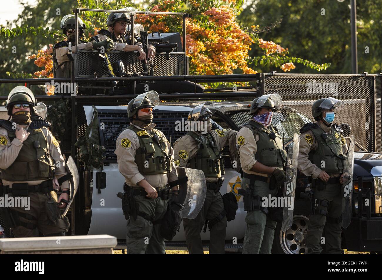 Black Lives Matter and community members hold a protest in front of the ...