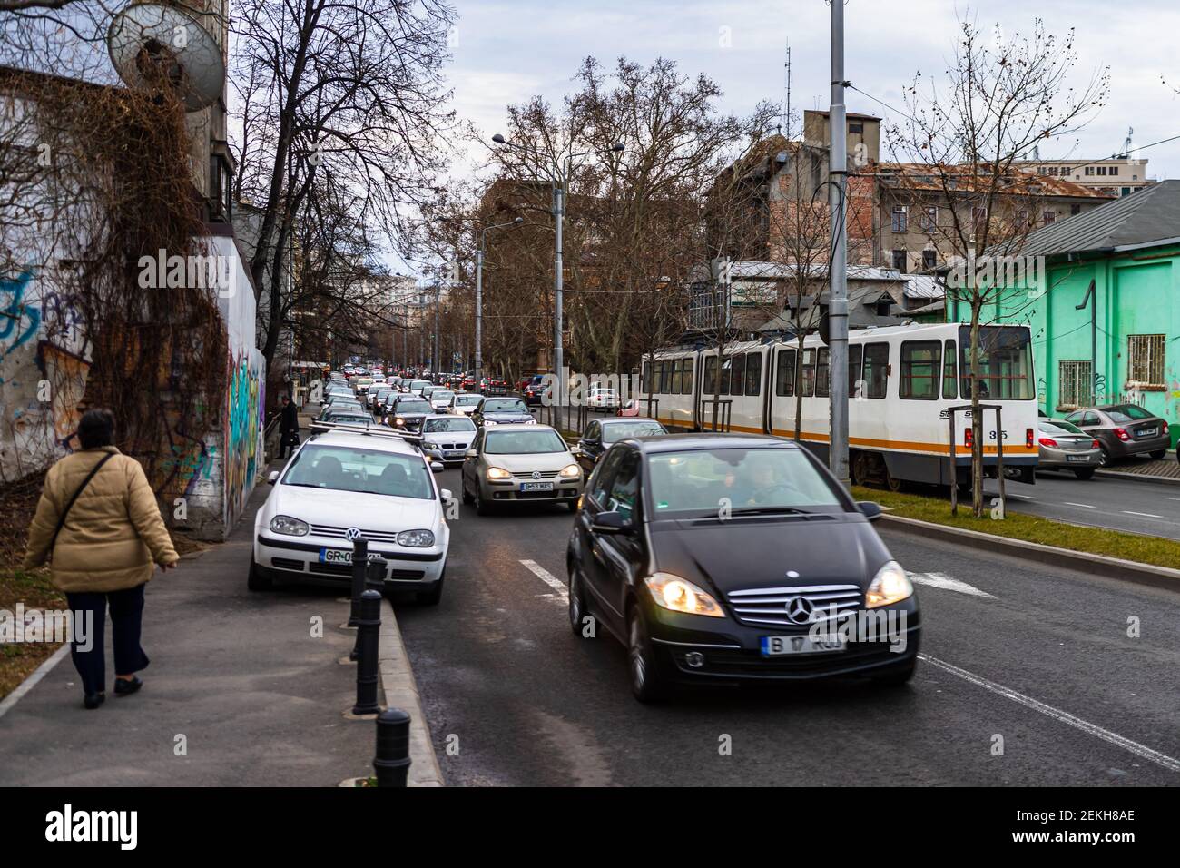 Car traffic at rush hour in downtown area of the city. Car pollution ...