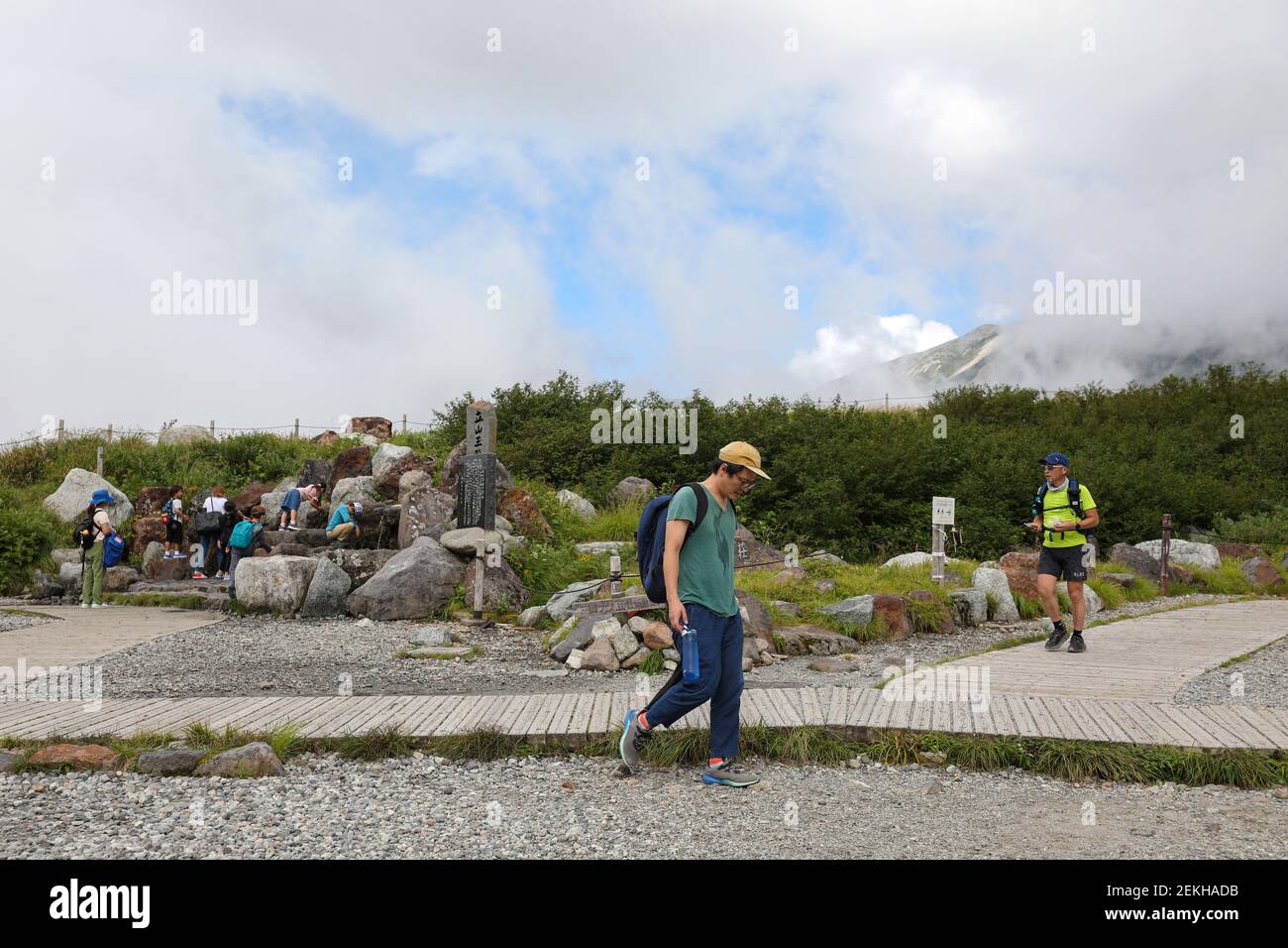 People return after hiking at the Japanese Alps. People spend weekends ...