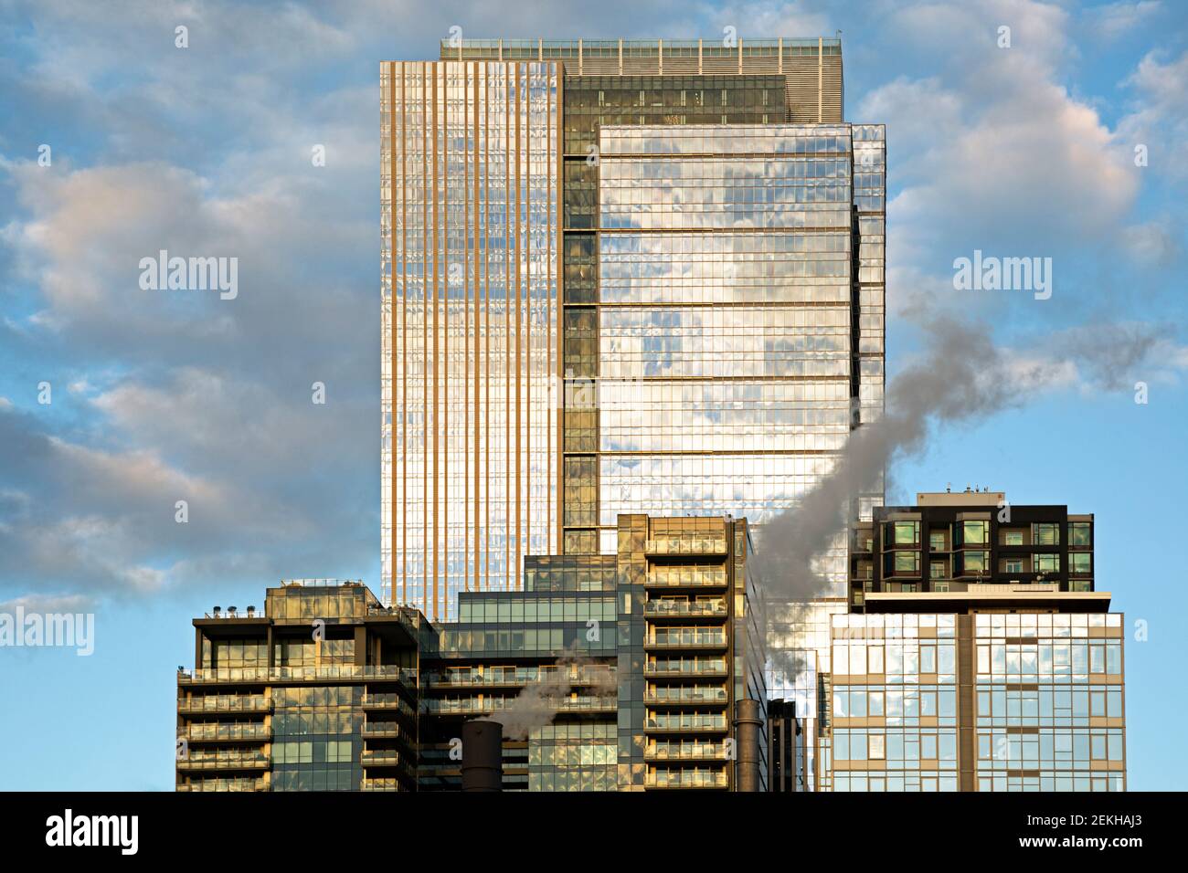 WA19330-00...WASHINGTON -Glass faced highrise towers reflecting the ...