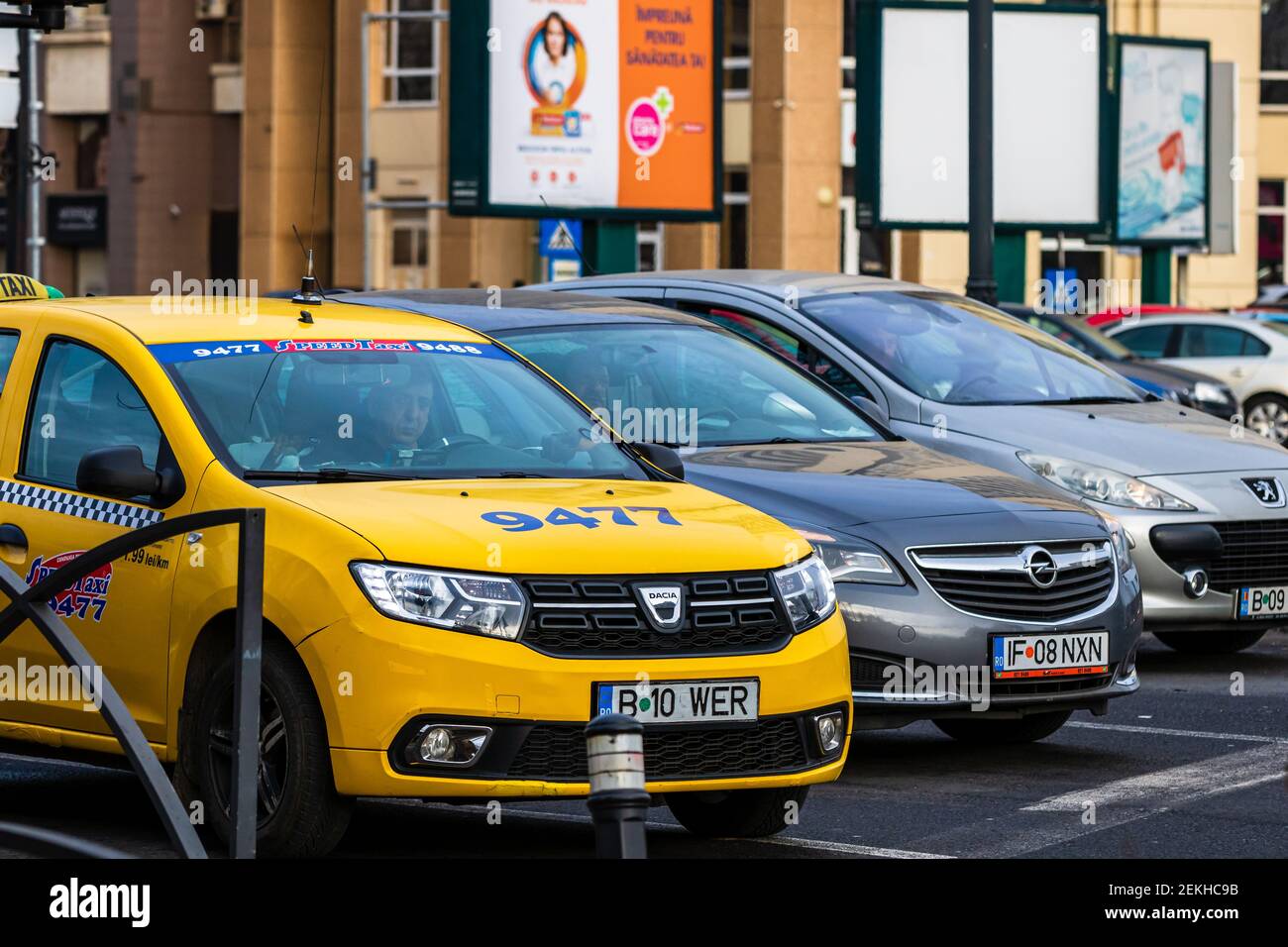 Car traffic at rush hour in downtown area of the city. Car pollution ...