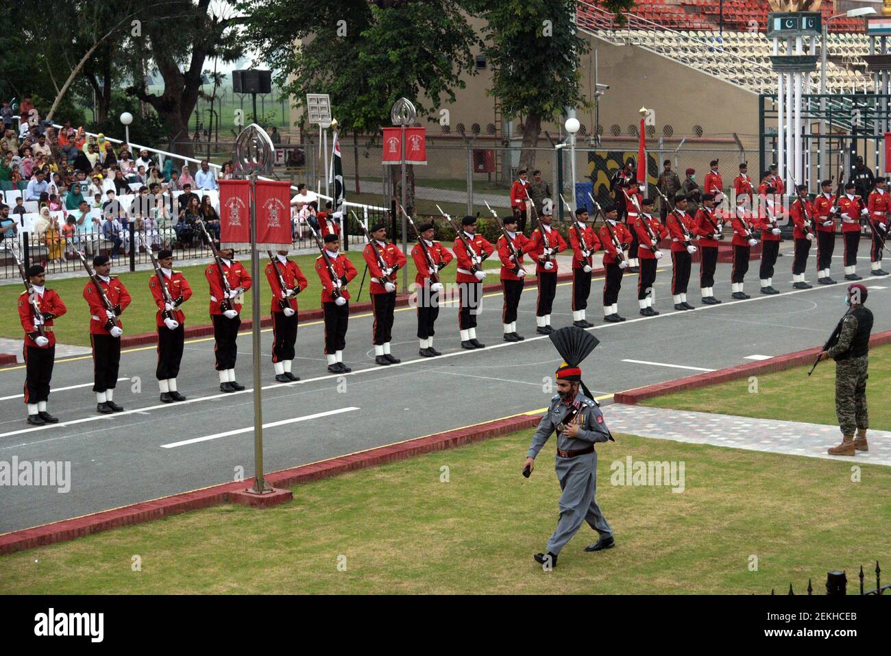 Punjab Rangers and soldiers in black uniform take a part of flag ...