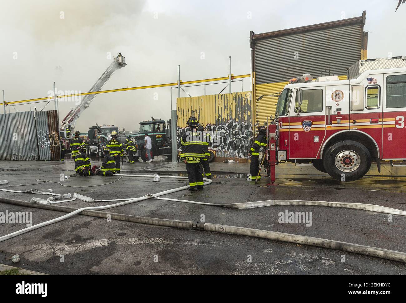 Firefighters battle massive salvage yard 4 alarm fire in the Bronx ...