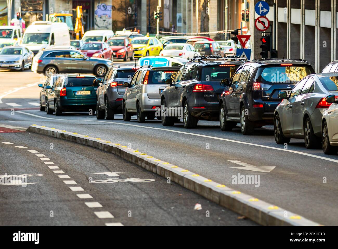 Car traffic at rush hour in downtown area of the city. Car pollution ...