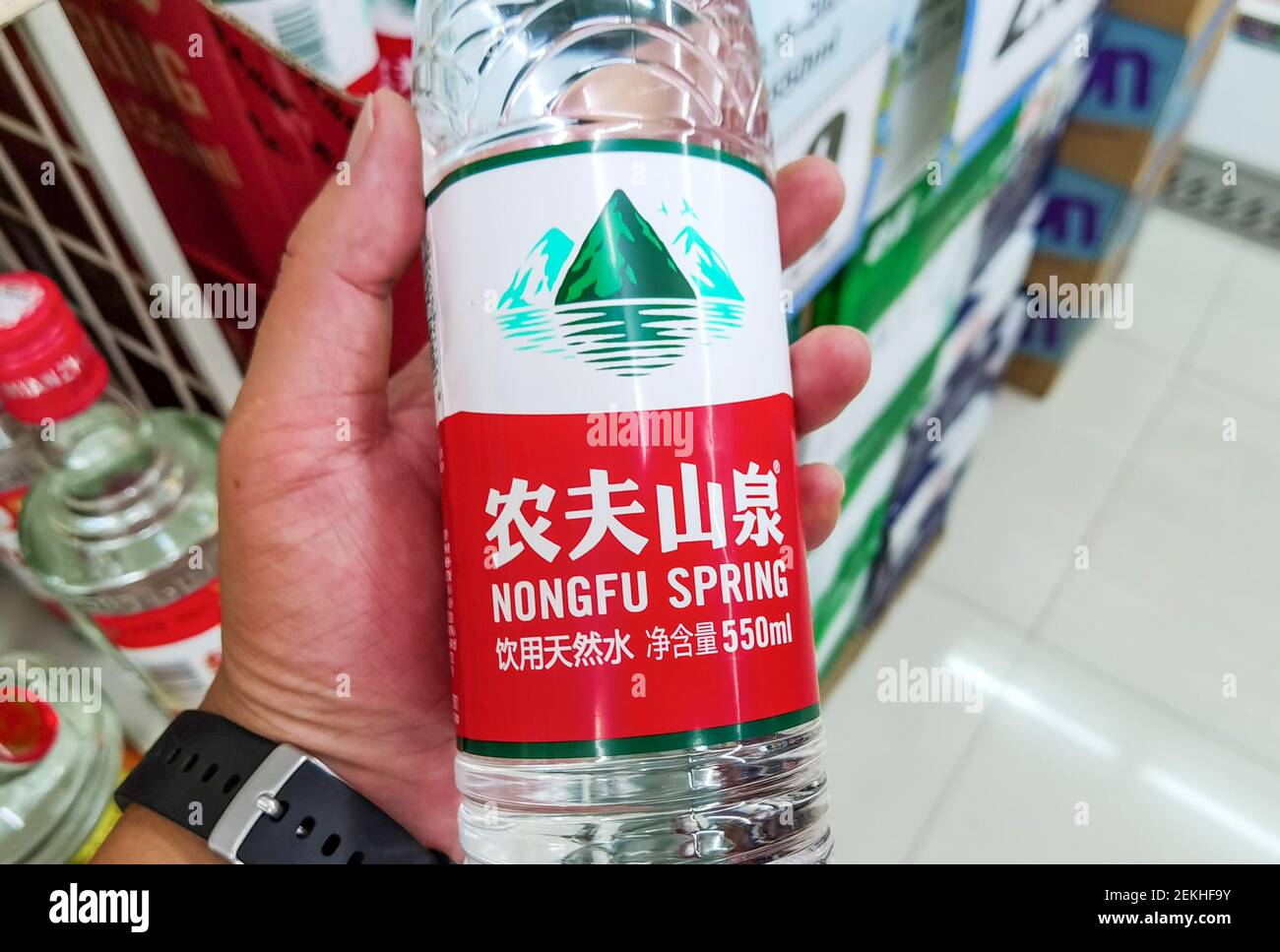 SHANGHAI, CHINA - SEPTEMBER 8, 2020 - A customer buys Nongfu Spring ...