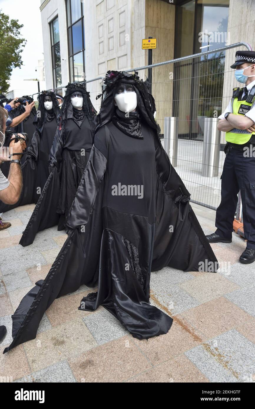 Members of the Black Brigade seen during the performance. Extinction ...