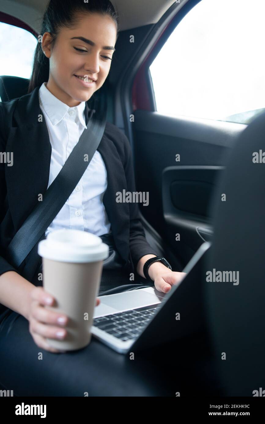 Woman in car laptop hi-res stock photography and images - Alamy