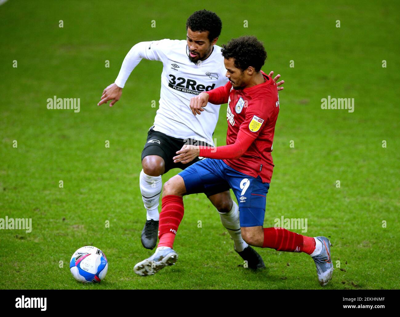 Huddersfield Town's Duane Holmes (right) and Derby County's Nathan ...