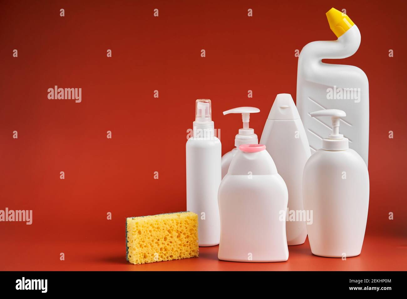 A set of blank clean white plastic containers of different shapes from ...