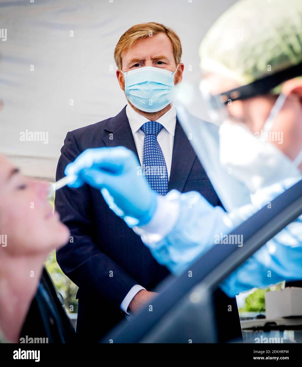 King Willem Alexander during a working visit to the corona test street ...