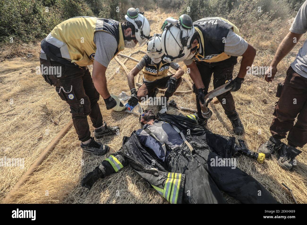Syrian Civil Defense (White Helmets) tries to rescue a member during ...