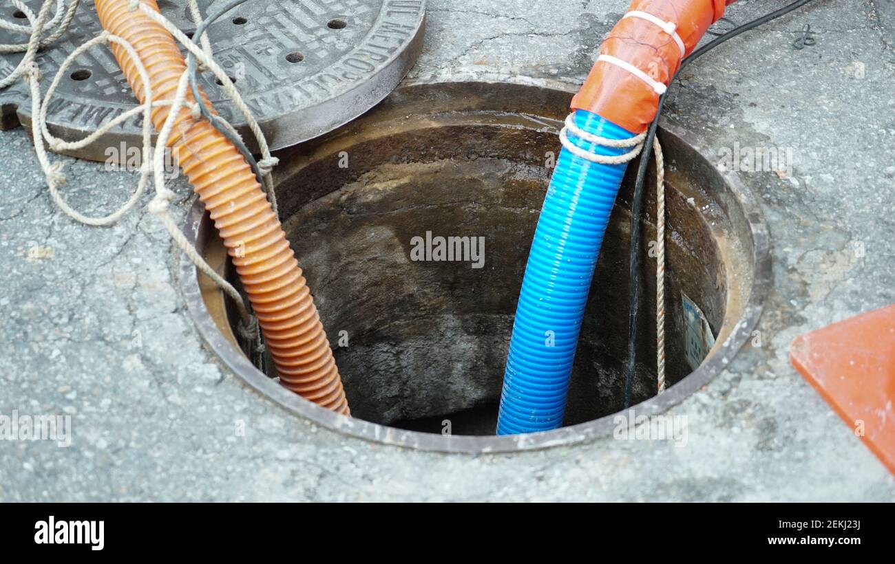 Sewer manhole construction on streets in Seoul, Korea Stock Photo - Alamy