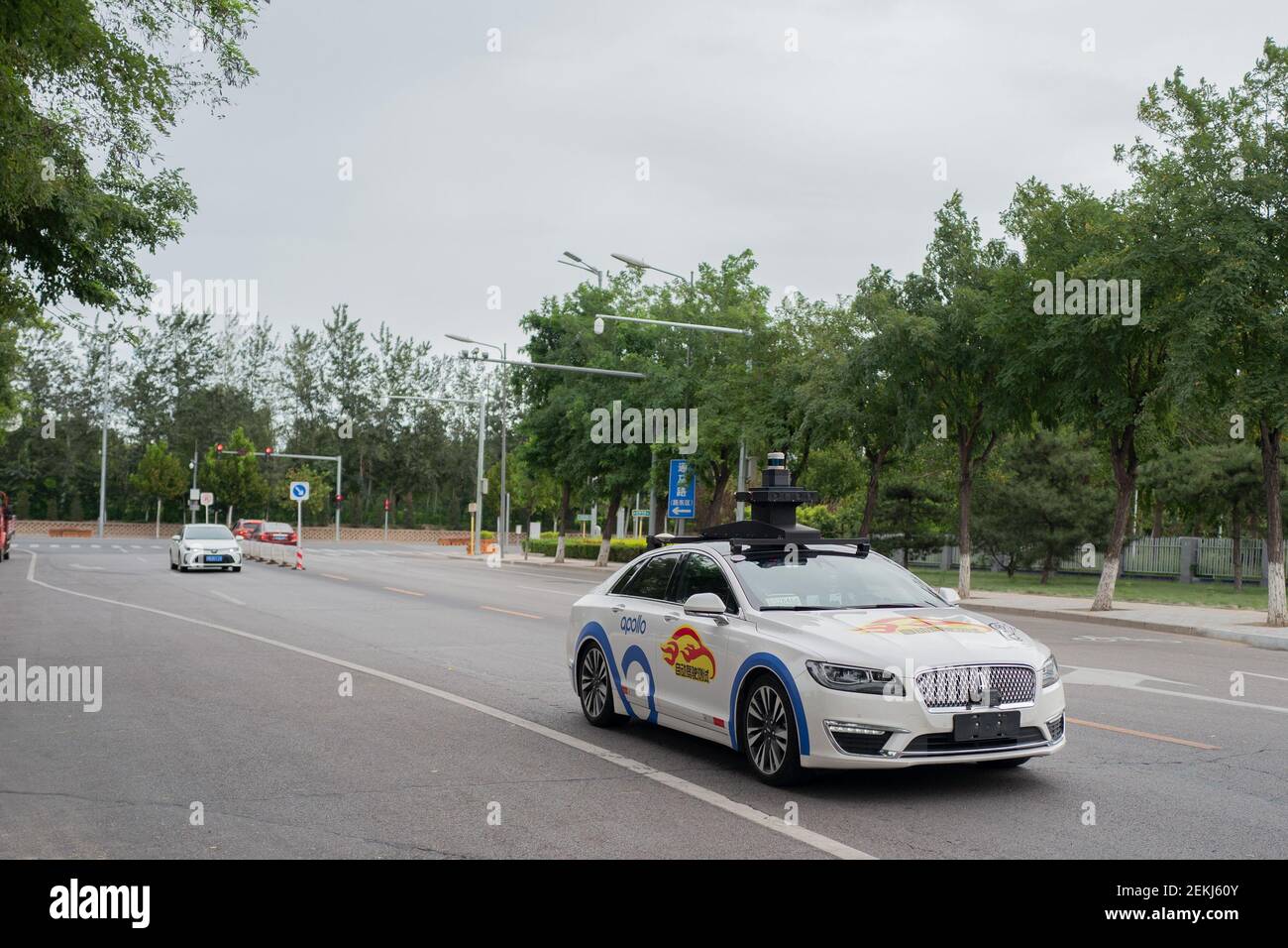 An Apollo Go Robotaxi drives on a road in Beijing, China, 10 September 2020. (Photo by Niu ...