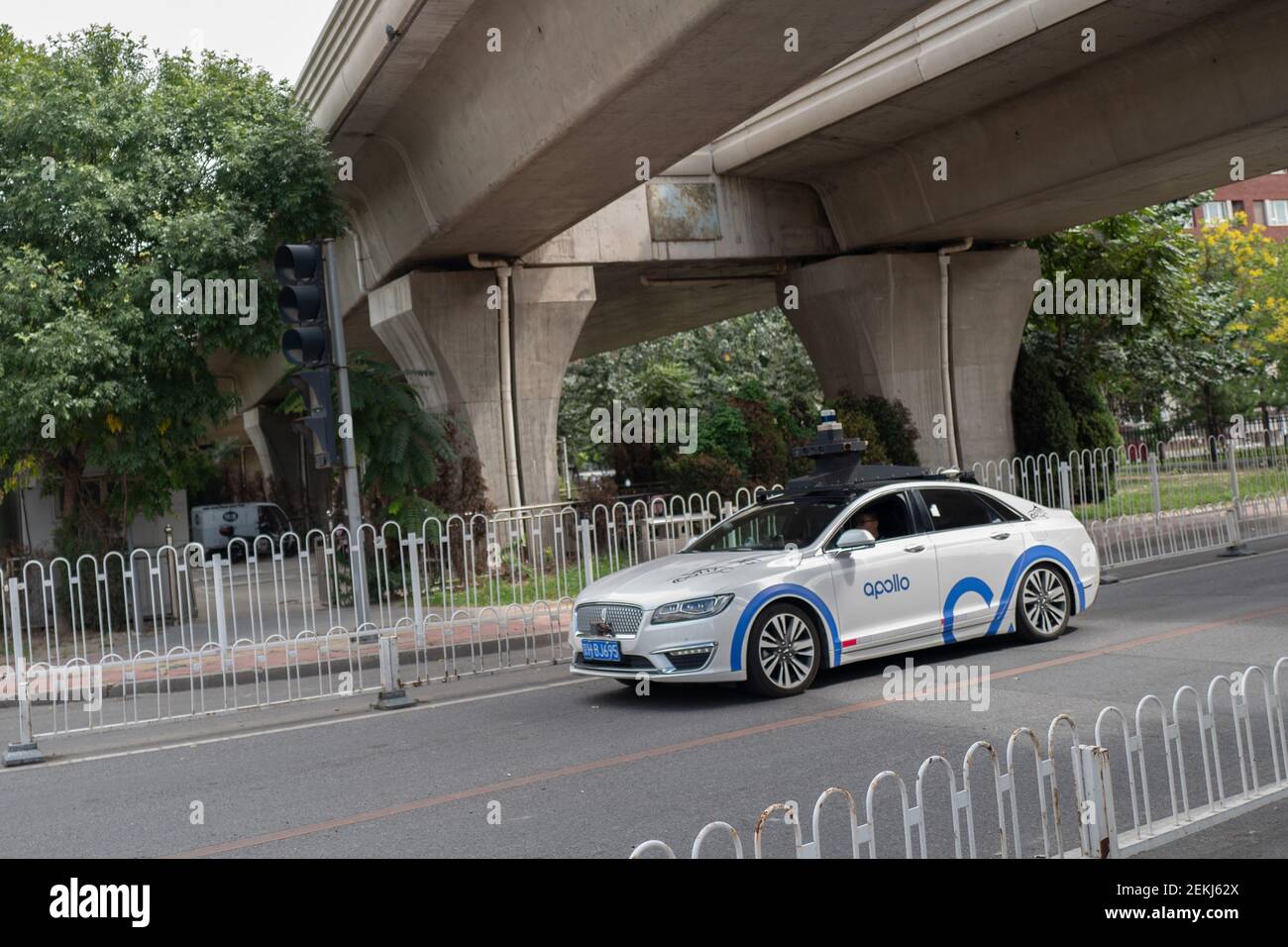 An Apollo Go Robotaxi drives on a road in Beijing, China, 10 September ...